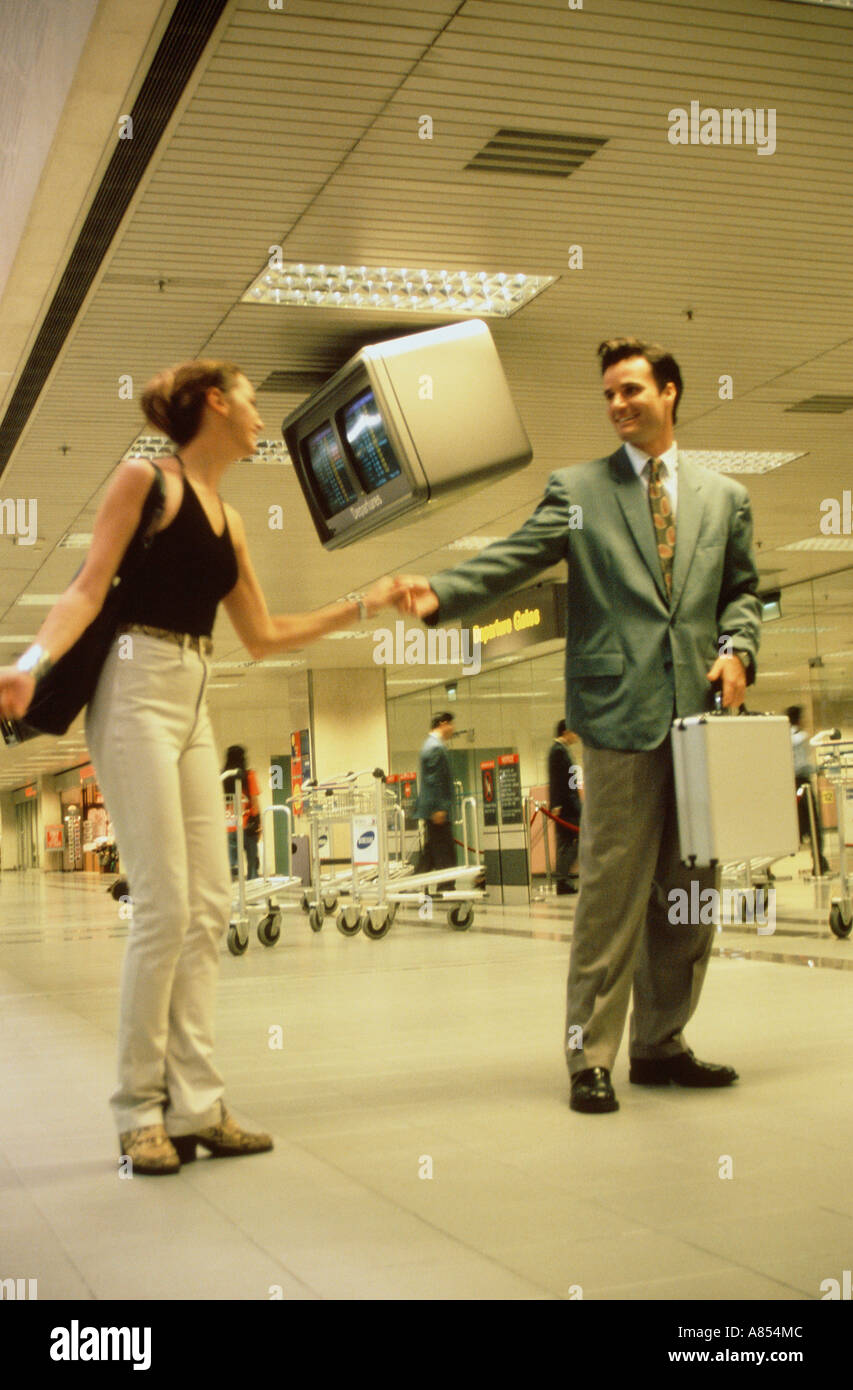 Young couple saying goodbye at airport Stock Photo - Alamy