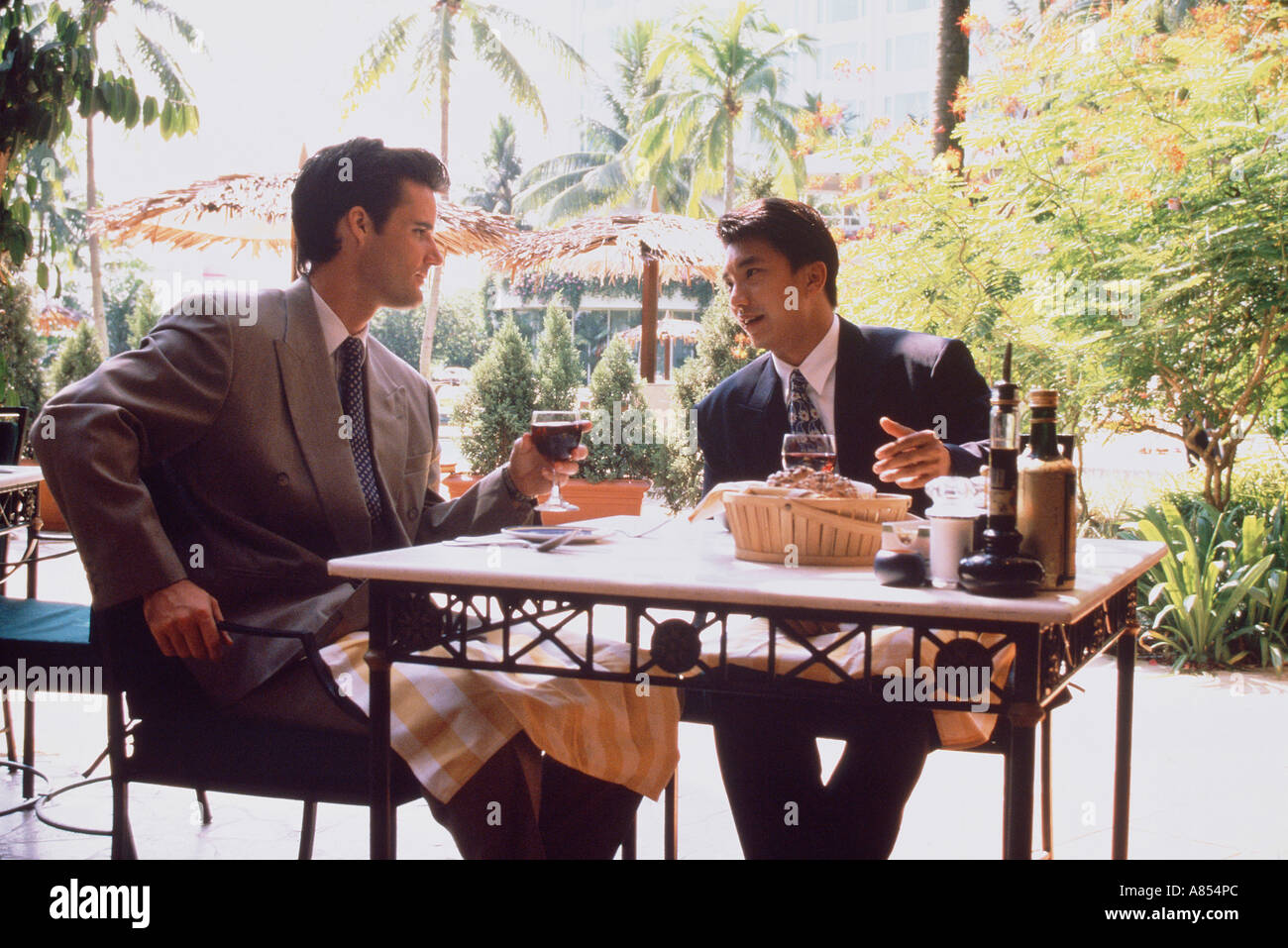 Two men sitting hi-res stock photography and images - Alamy