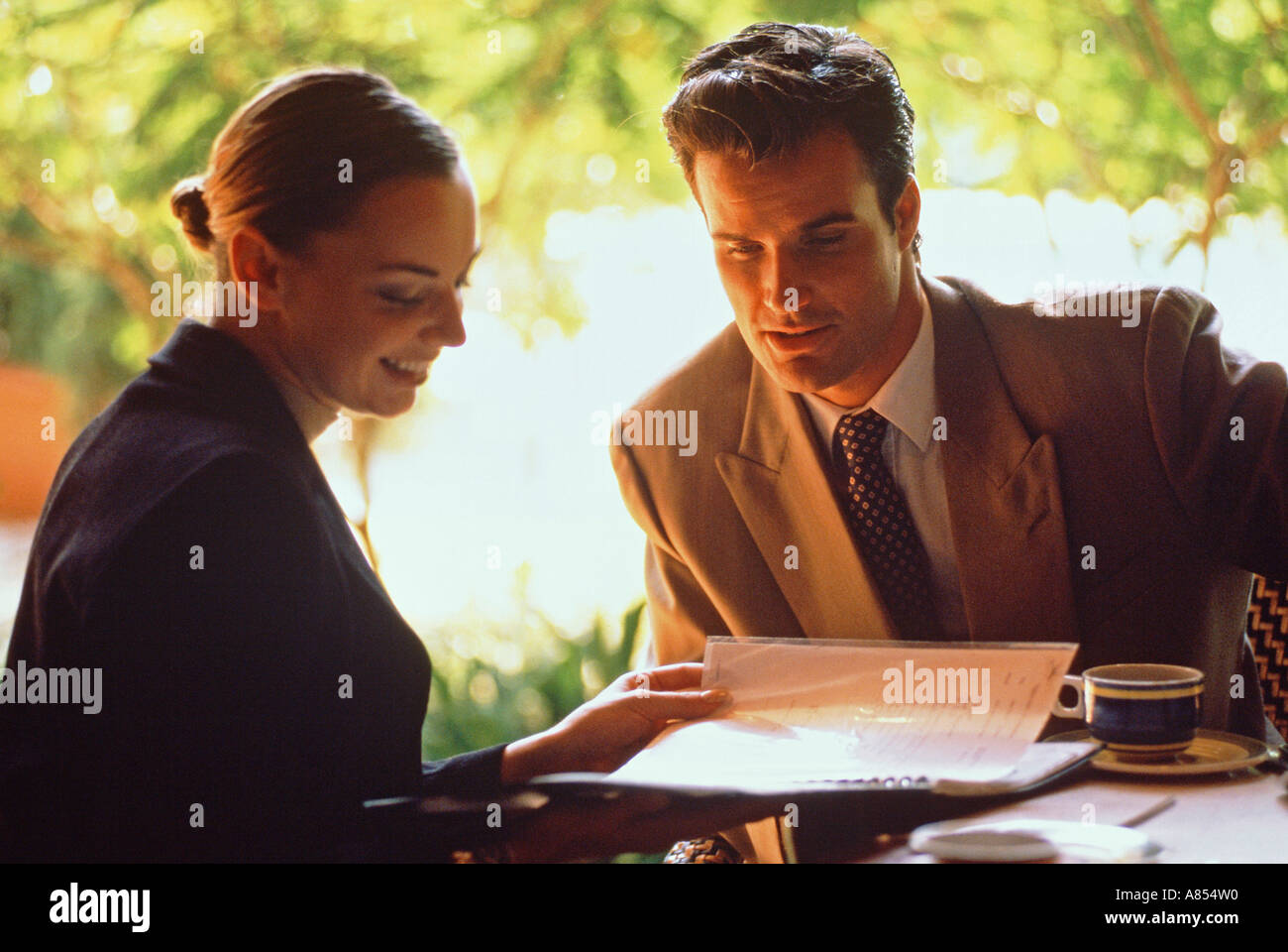 Professional couple suits hi-res stock photography and images - Alamy