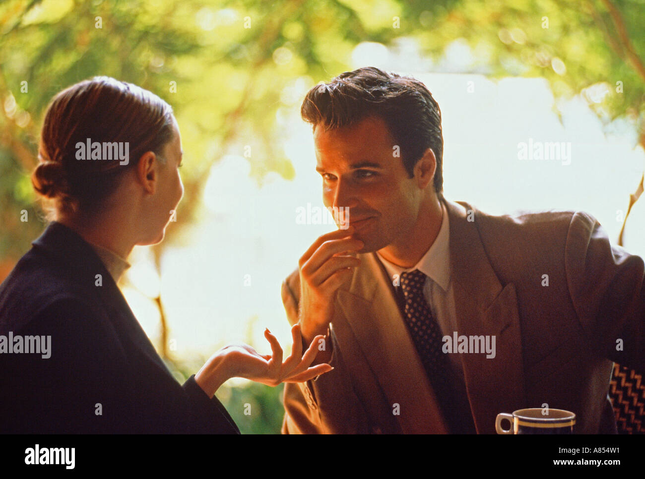 Professional couple suits hi-res stock photography and images - Alamy