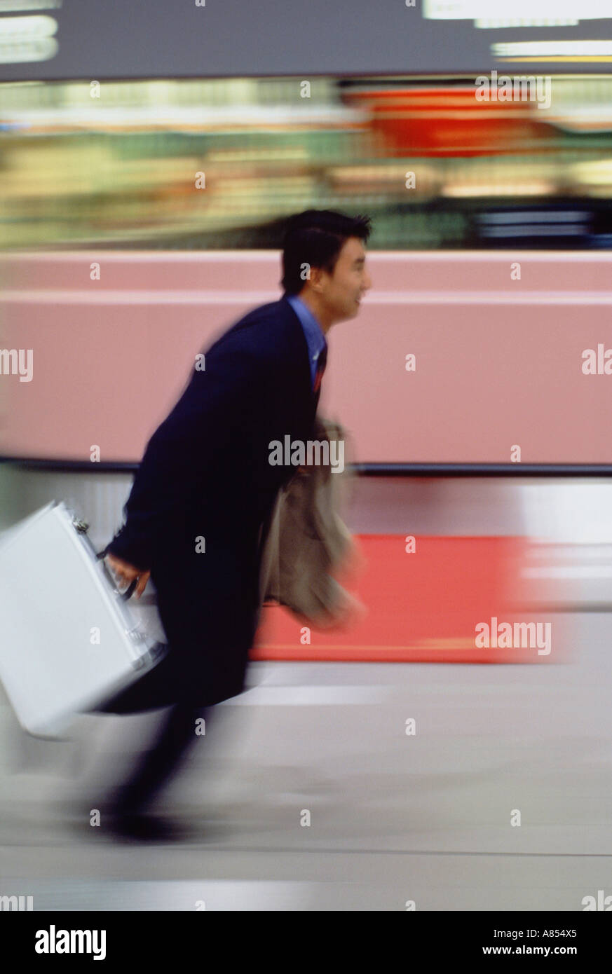 Man running catch plane hi-res stock photography and images - Alamy