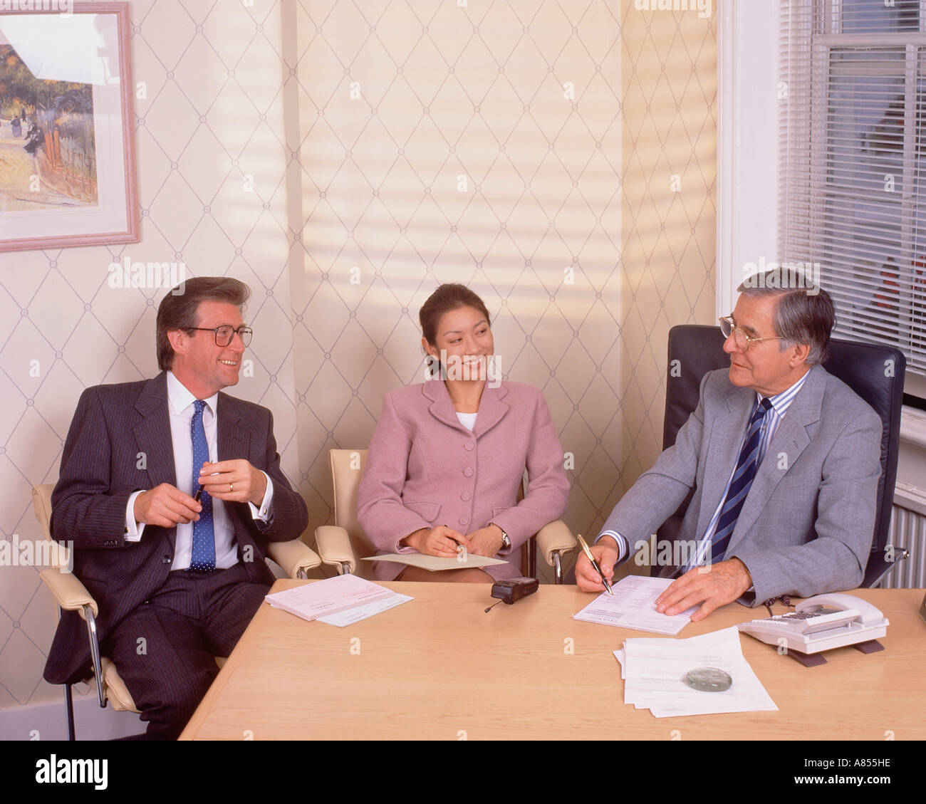 One woman two men in hi-res stock photography and images - Alamy