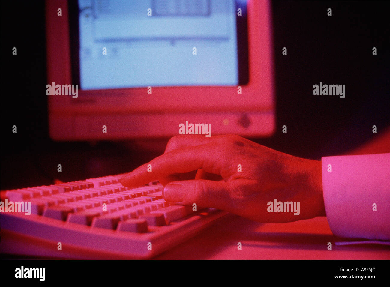 Keyboard screen hands closeup colour hi-res stock photography and ...