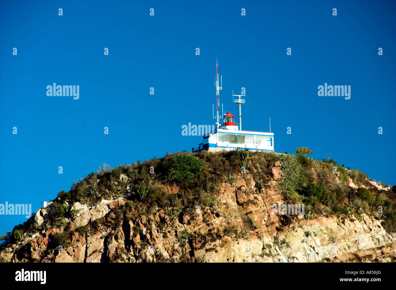 The lighthouse on a hill at the entrance to the port of Mazatlan Mexico ...