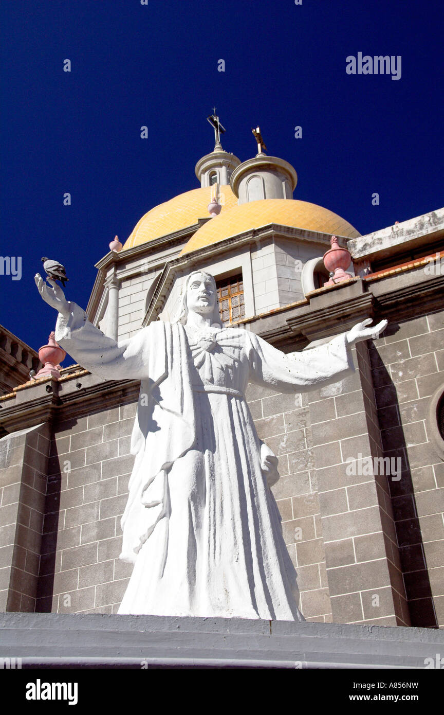 A statue of Christ outside the Immaculate Conception Church, a basilica ...