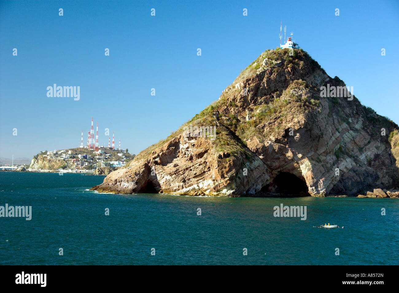 The lighthouse on a hill at the entrance to the port of Mazatlan ...