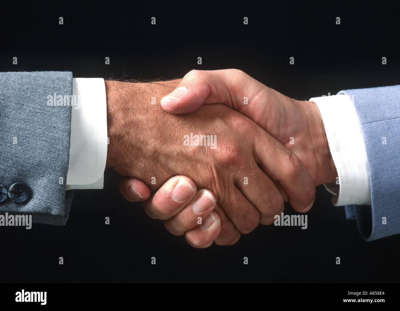 Shaking hands with hi-res stock photography and images - Alamy