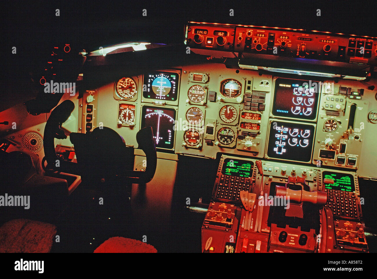 Flight deck simulator of Boeing 767 passenger jet aircraft. Night view ...