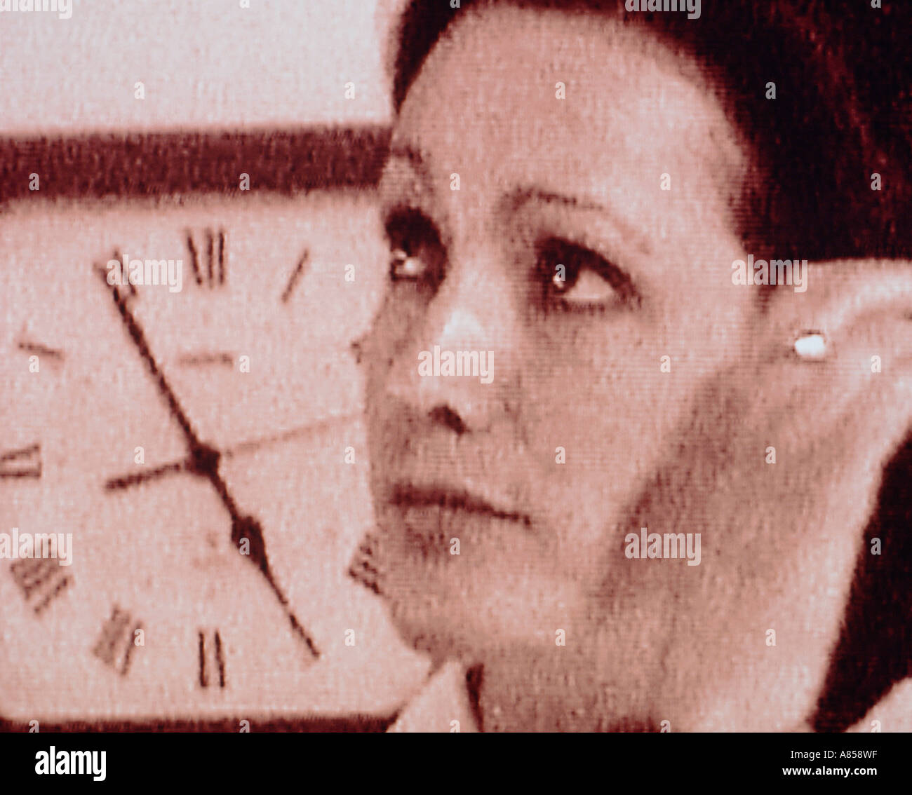 Close-up of woman and clock face Stock Photo - Alamy