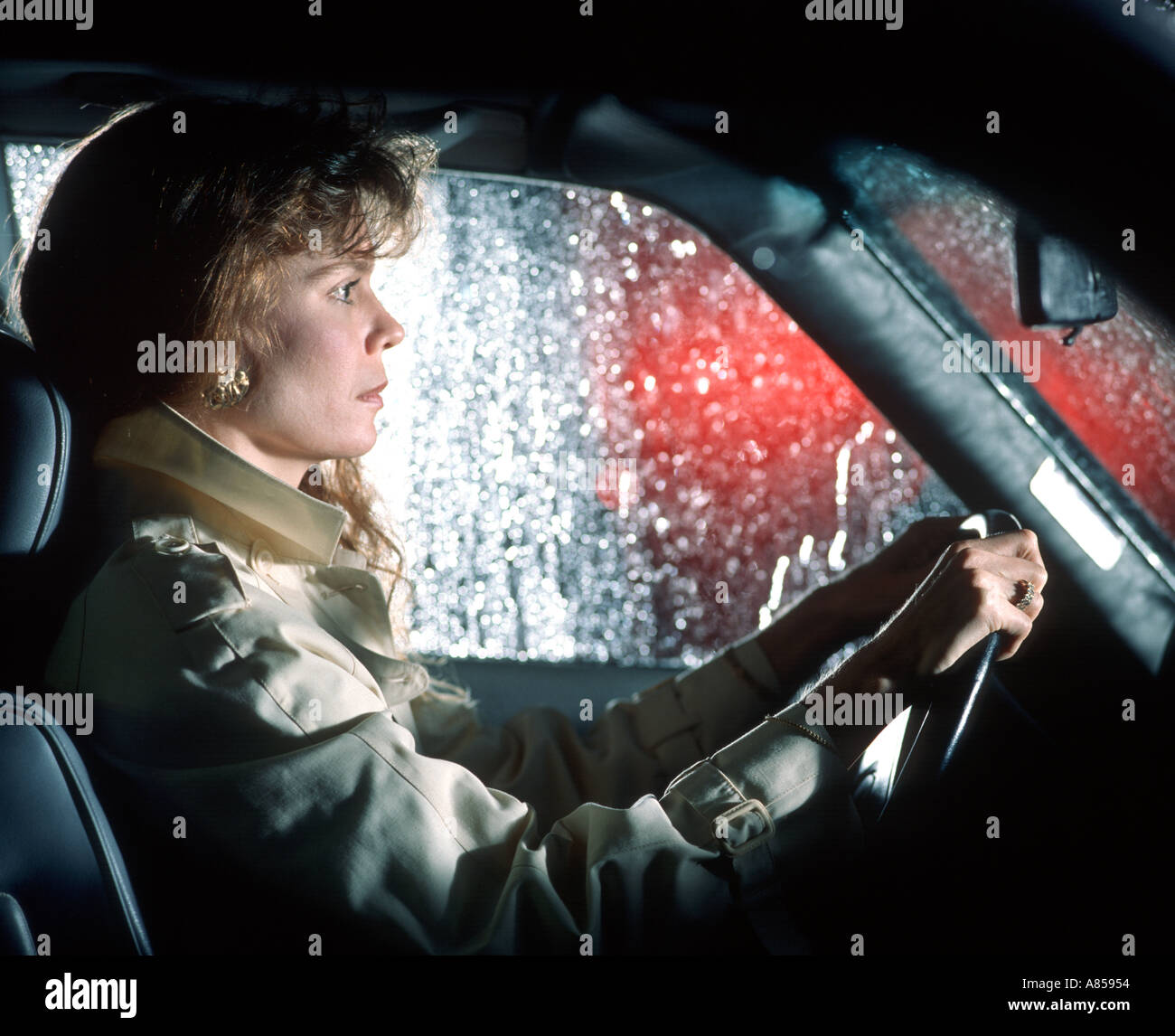 Woman driving at night hi-res stock photography and images - Alamy