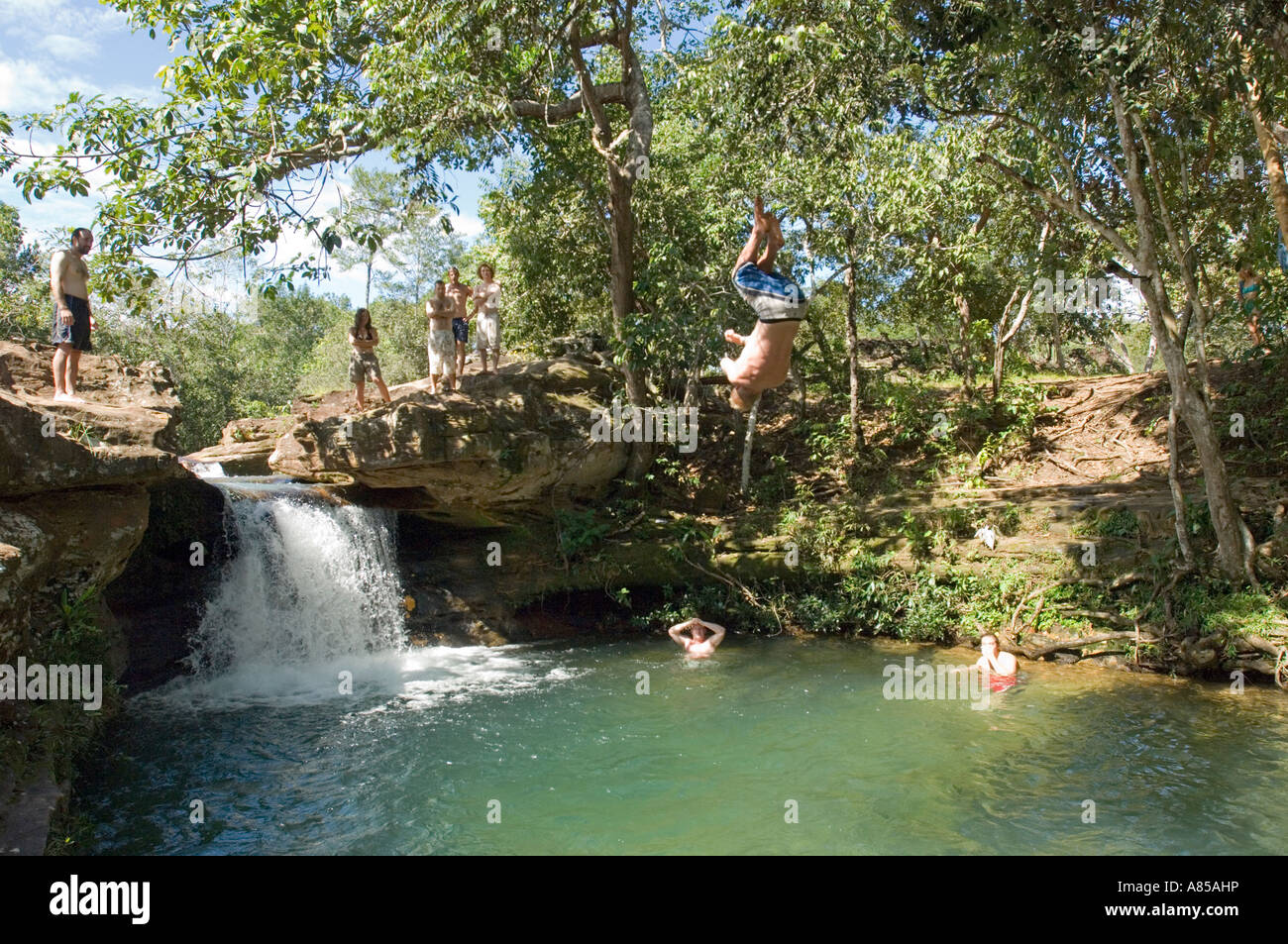 Group dive jump into pool hi-res stock photography and images - Alamy