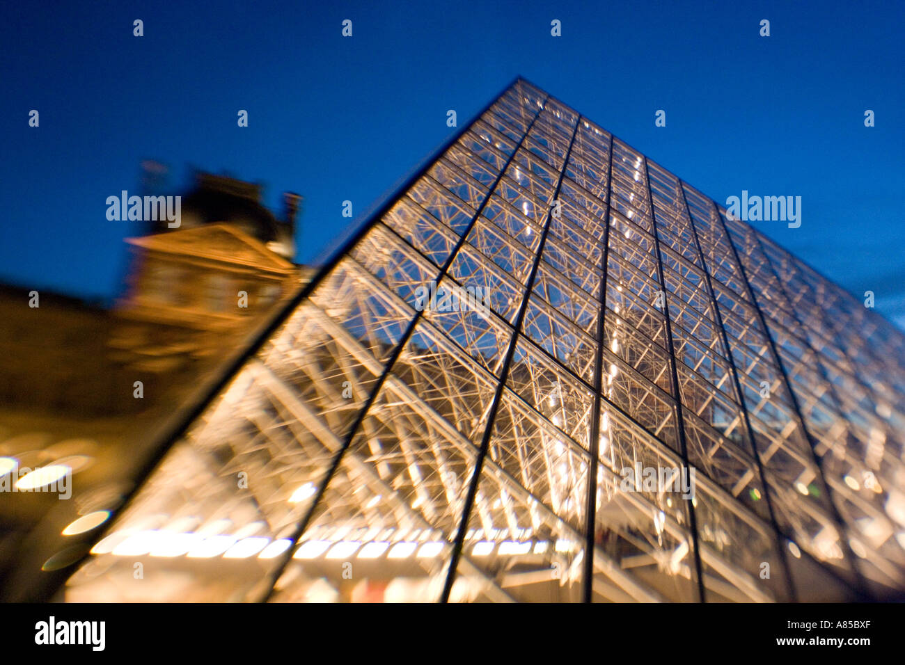 Pyramid entrance to The Louvre at dusk Paris France Stock Photo - Alamy