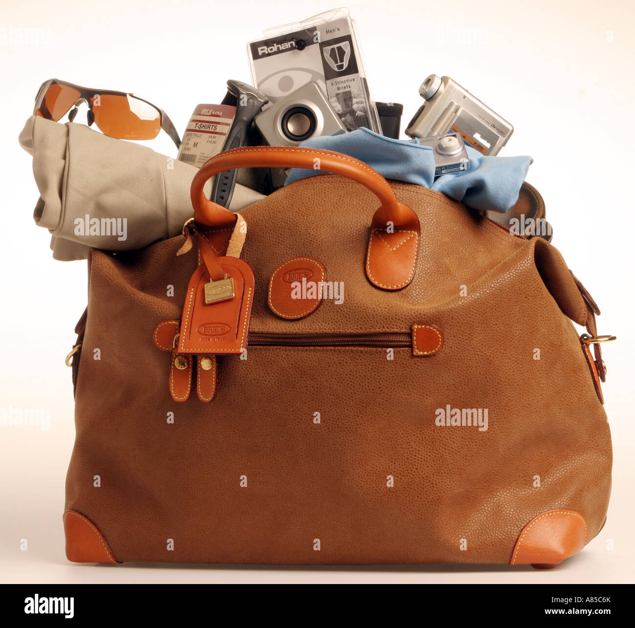 stuffed hand baggage Stock Photo - Alamy