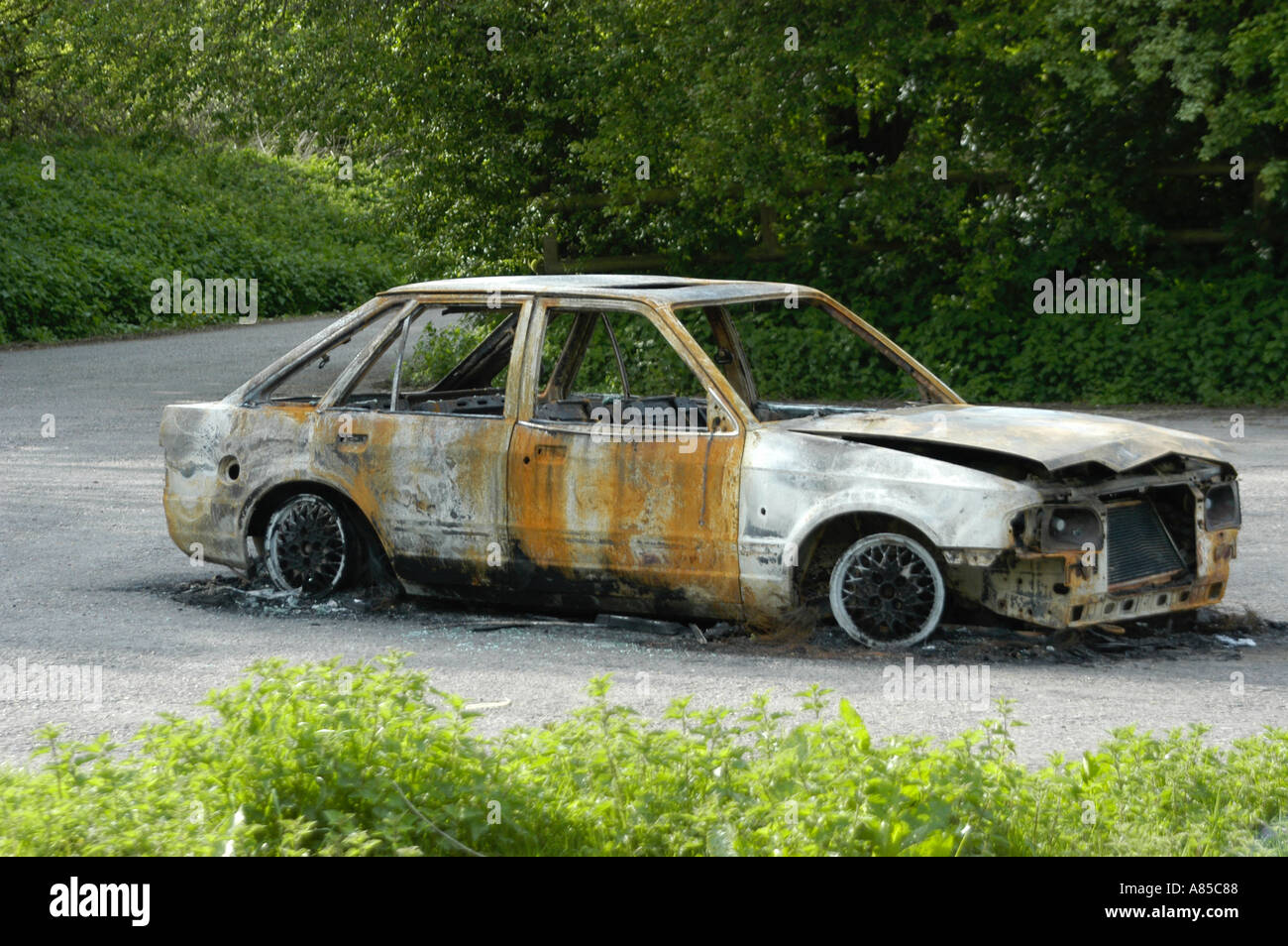 Burnt out wreck of a Ford Escort Car Stock Photo - Alamy