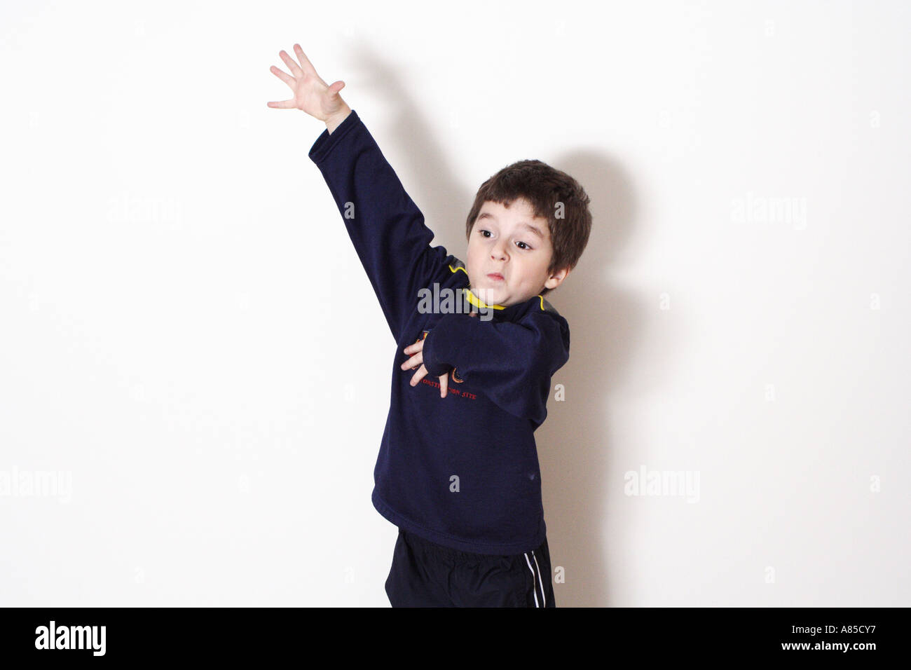 Boy posing in front of the camera Stock Photo - Alamy