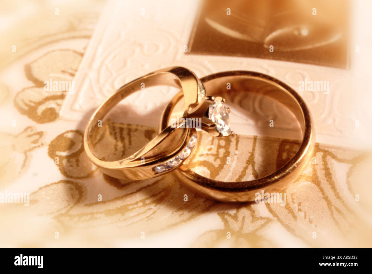 Weddings rings on invitation Stock Photo - Alamy