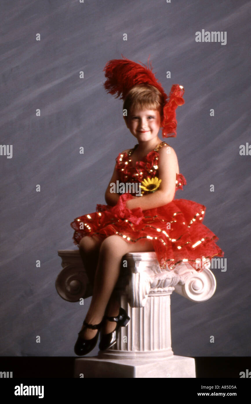 Portrait of Young female tap dancer in red costume Stock Photo - Alamy