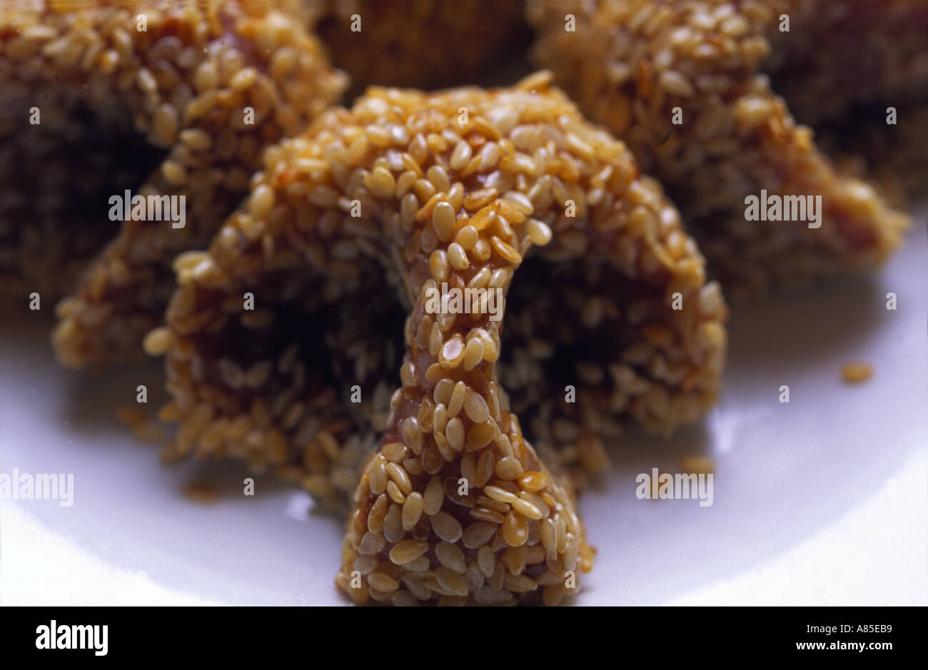 sticky rice sweet ball in triangle shape top with sesame dimsum from ...