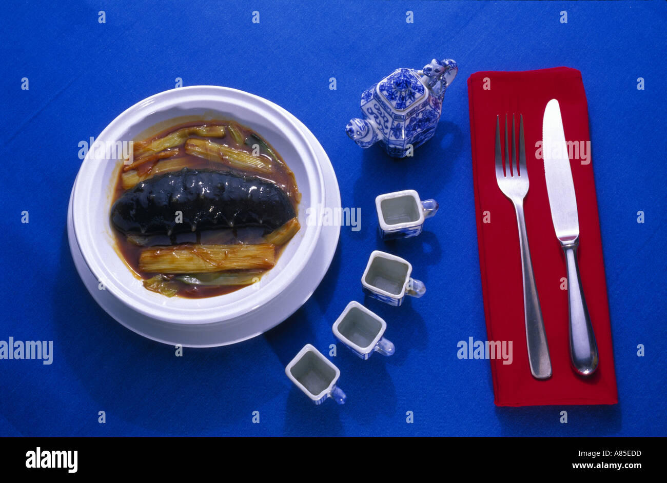 Sea cucumber sea slug with tofu stick Stock Photo - Alamy