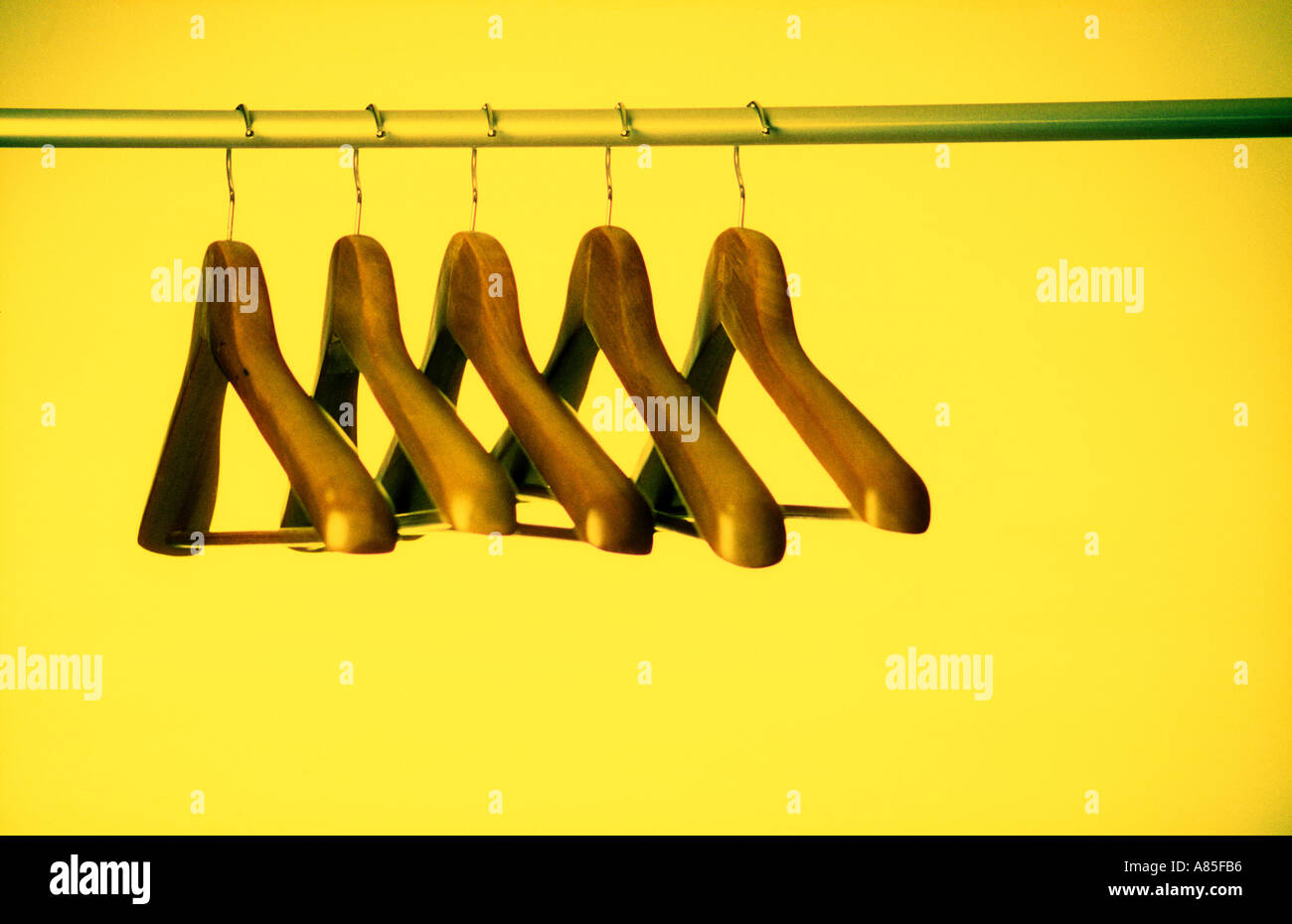 ROW OF HANGERS Stock Photo - Alamy