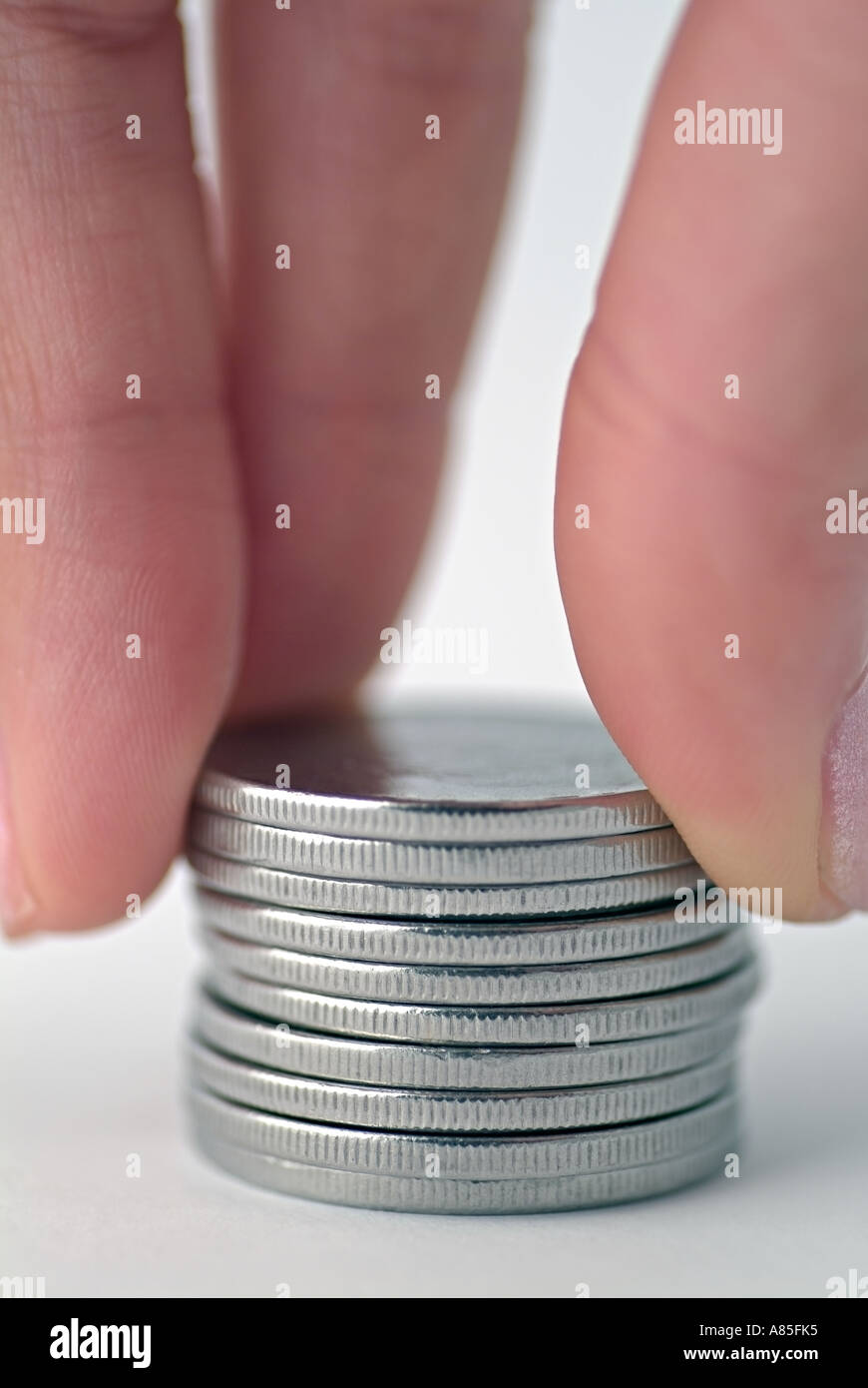 Accountant stacking coins hi-res stock photography and images - Alamy