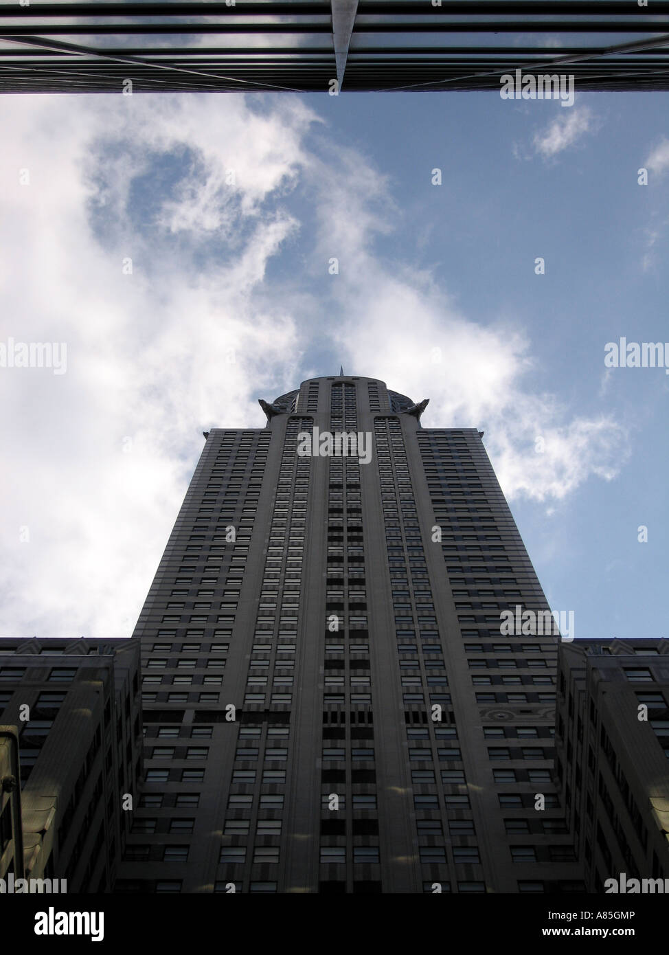 Looking up at the Chrysler office building reaching upwards New York ...