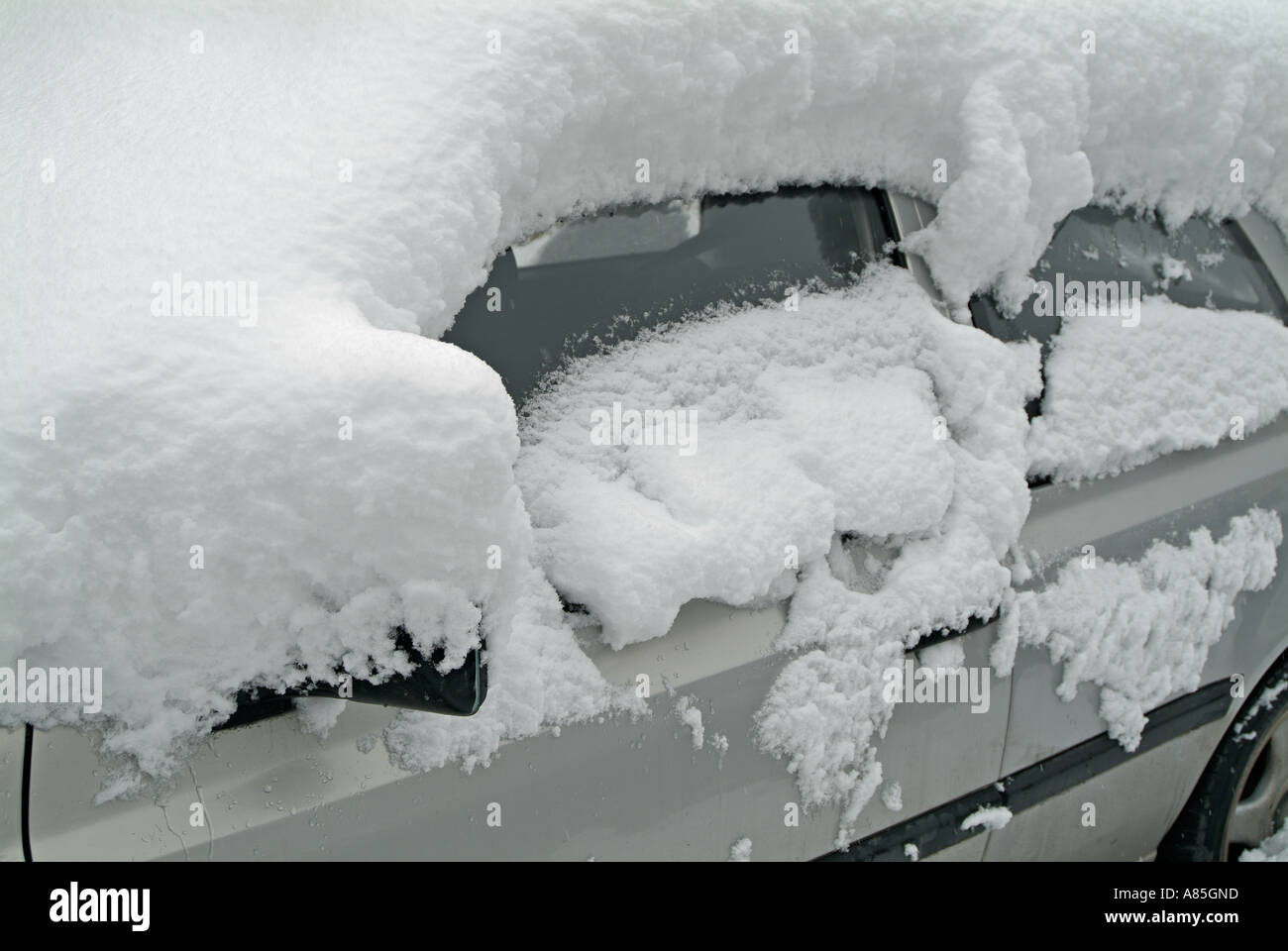 Snow Covered Car Stock Photo - Alamy