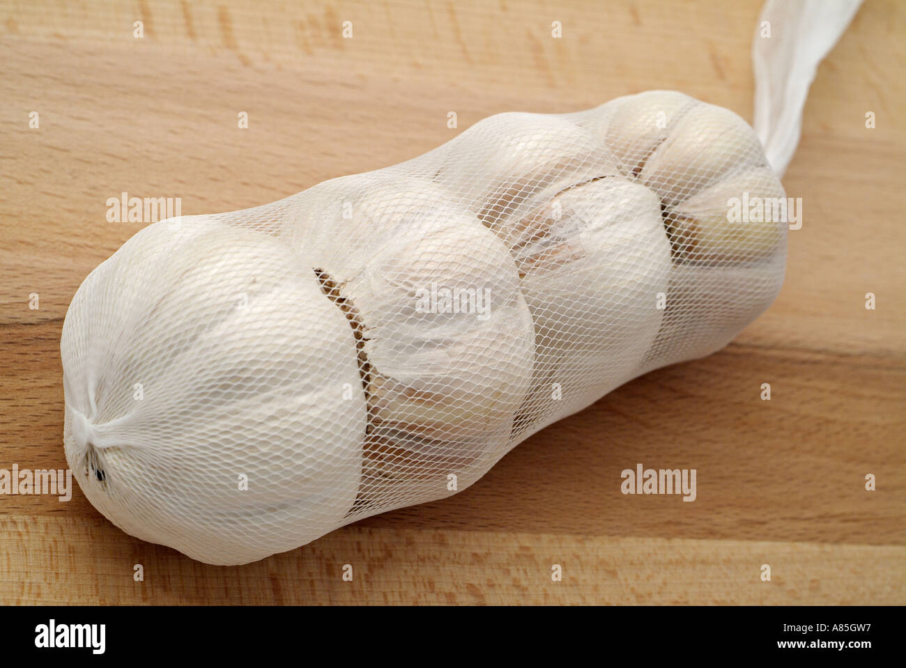 Garlic in net hi-res stock photography and images - Alamy