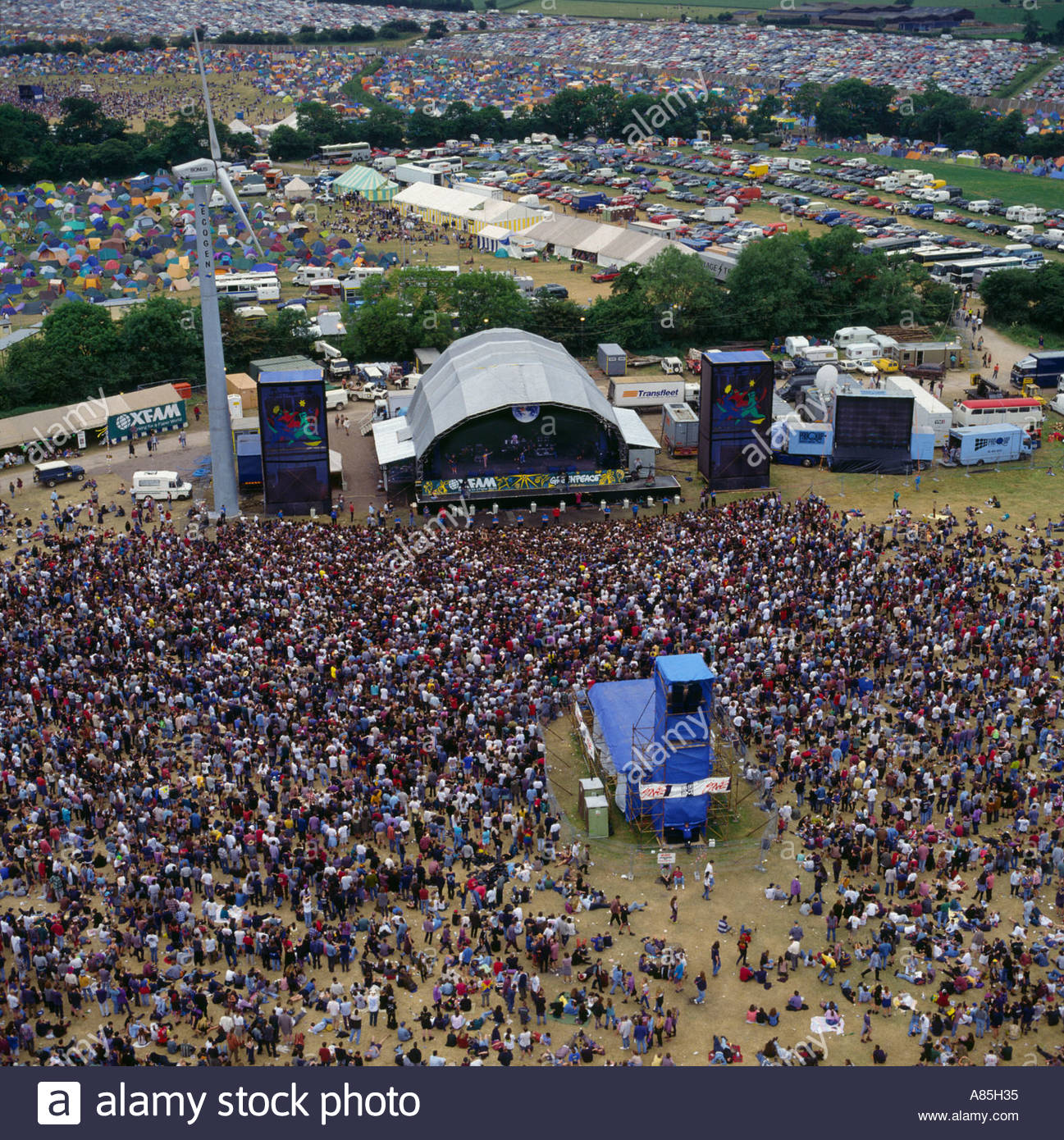 Stage and crowds at Glastonbury Music Festival Somerset UK aerial view ...