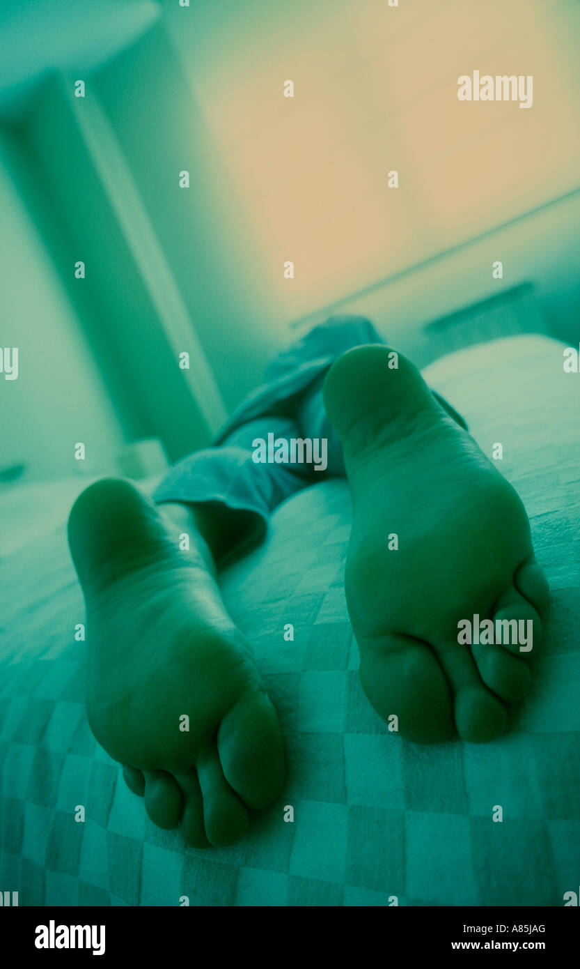 WOMAN SLEEPING RELAXED IN BED Stock Photo - Alamy