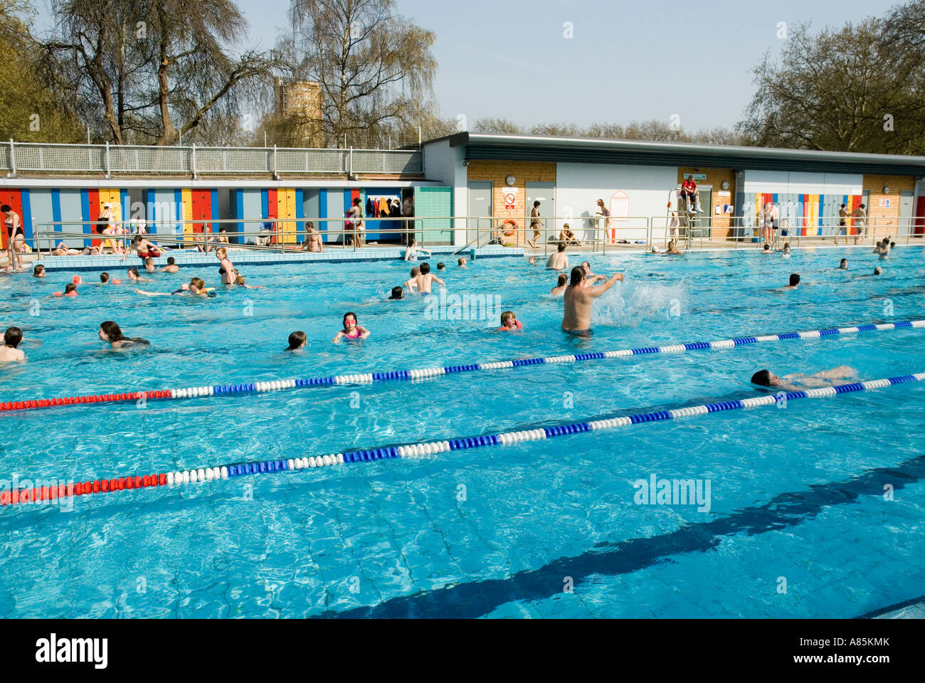 People enjoying sunny afternoon London Fields LIDO London Borough of ...