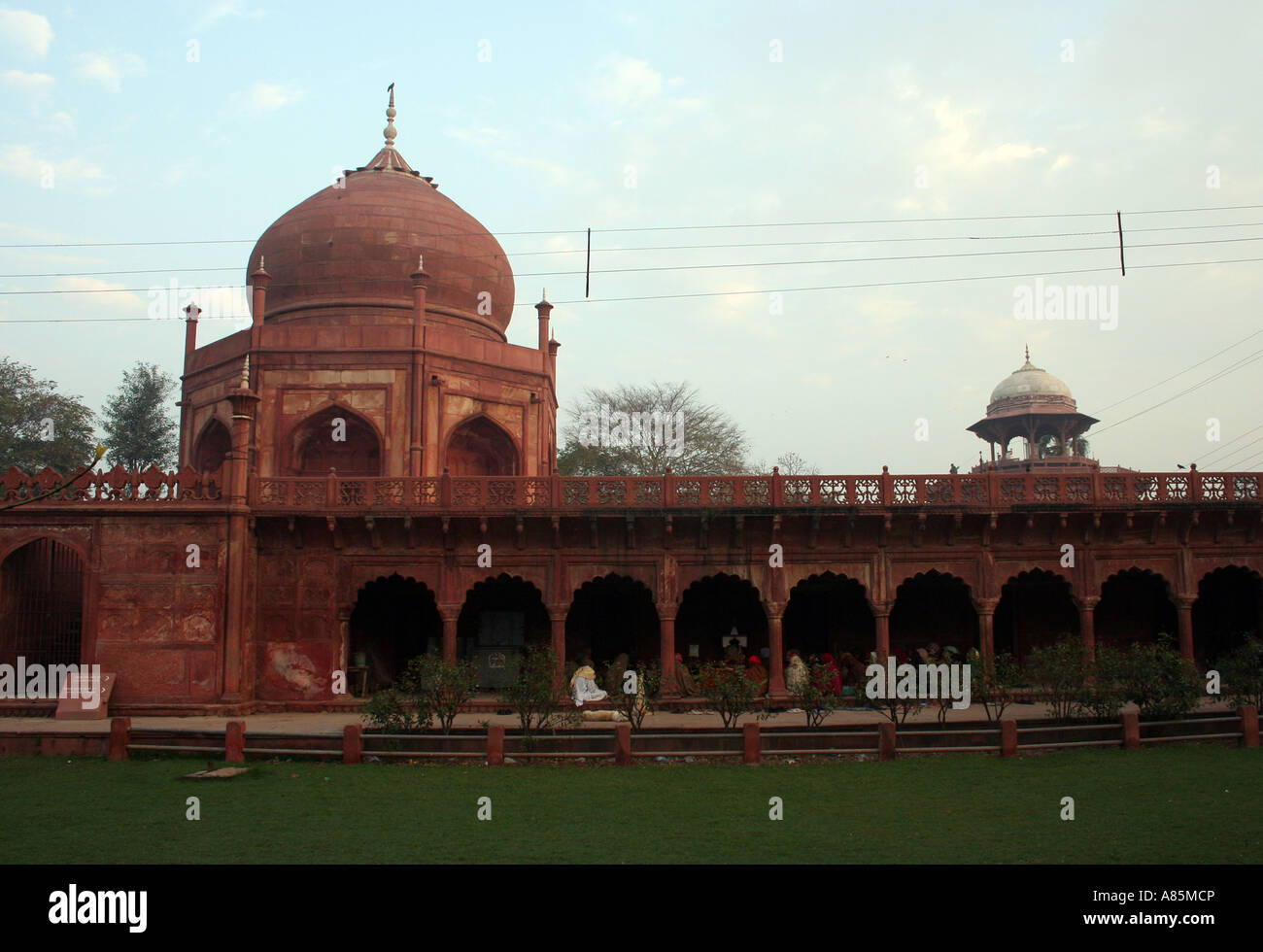 Red brick dome of one of the outer buildings of the Taj Mahal, Agra ...