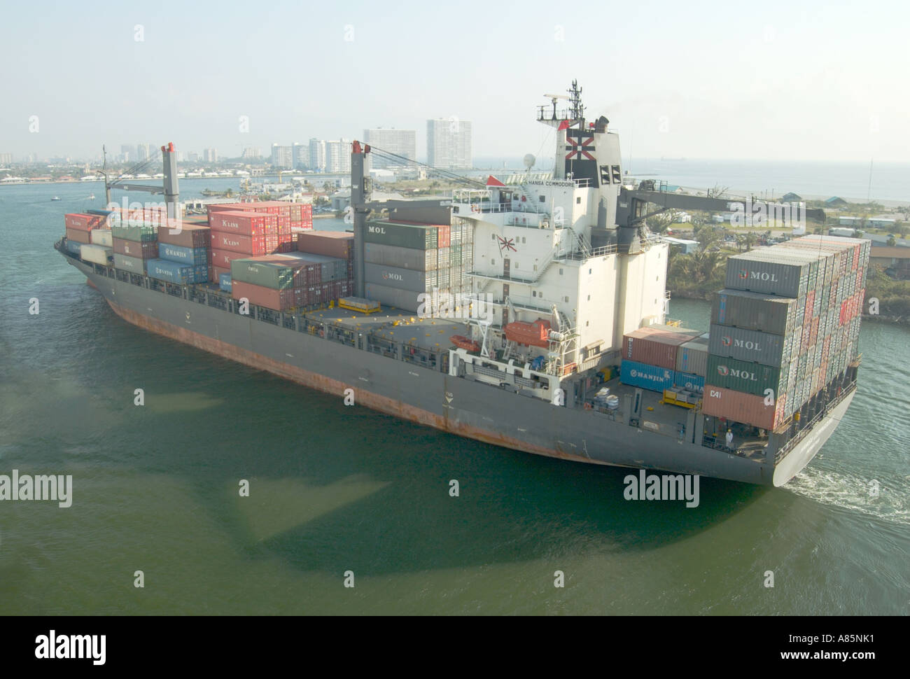 Container Ship leaving port for the open sea Stock Photo - Alamy