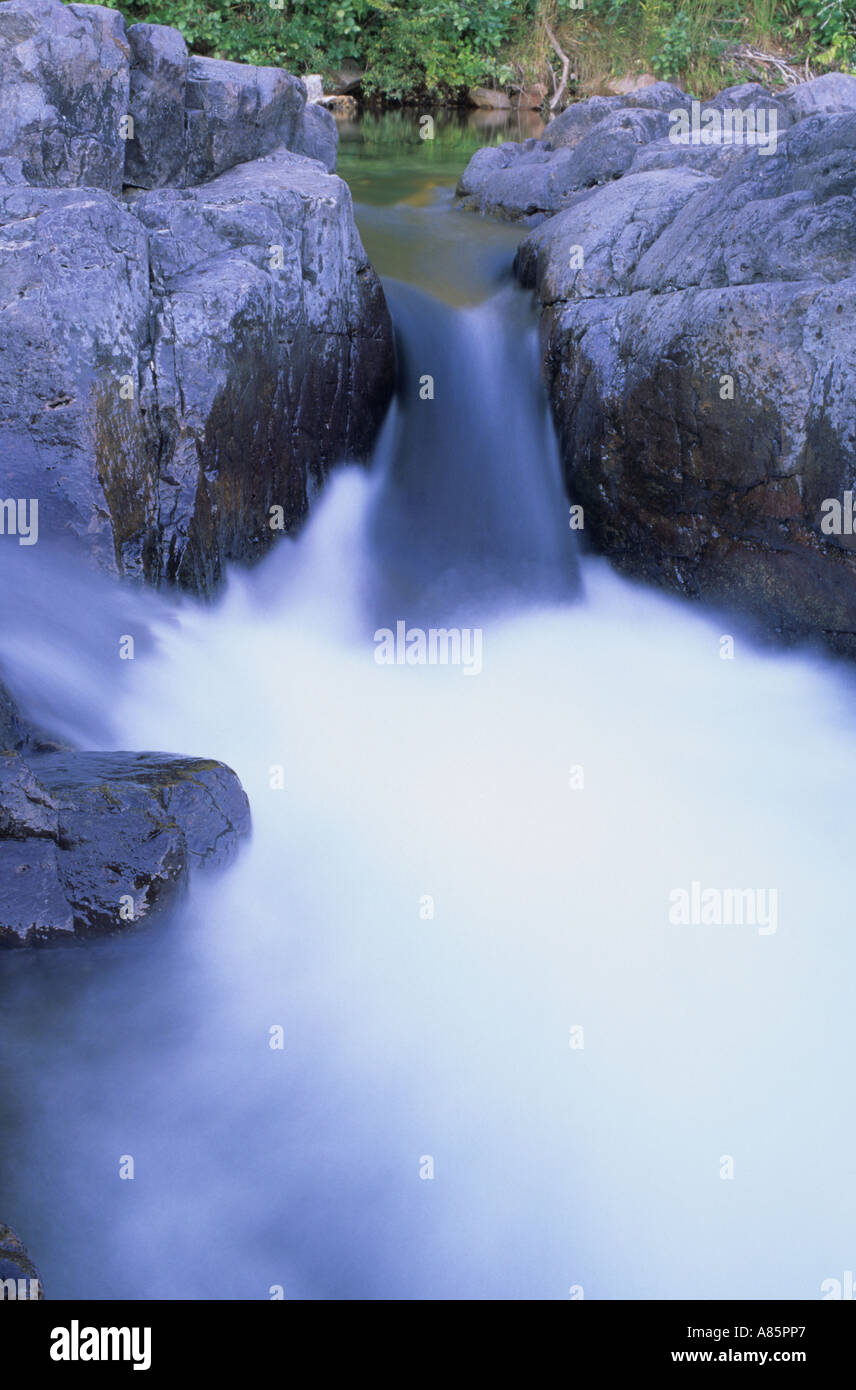 Fresh clear water spills over smooth rocks at Johnson's Shut Ins State ...