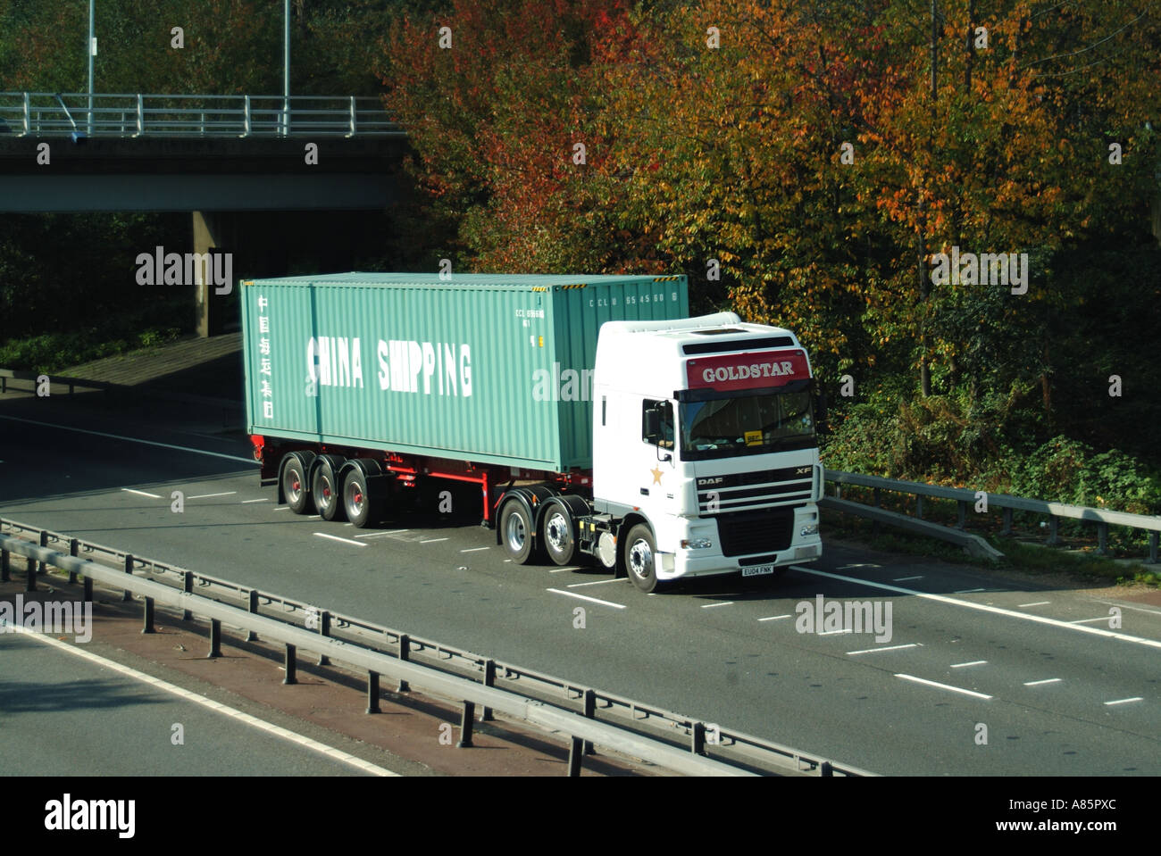 Truck passing under bridge High Resolution Stock Photography and Images ...