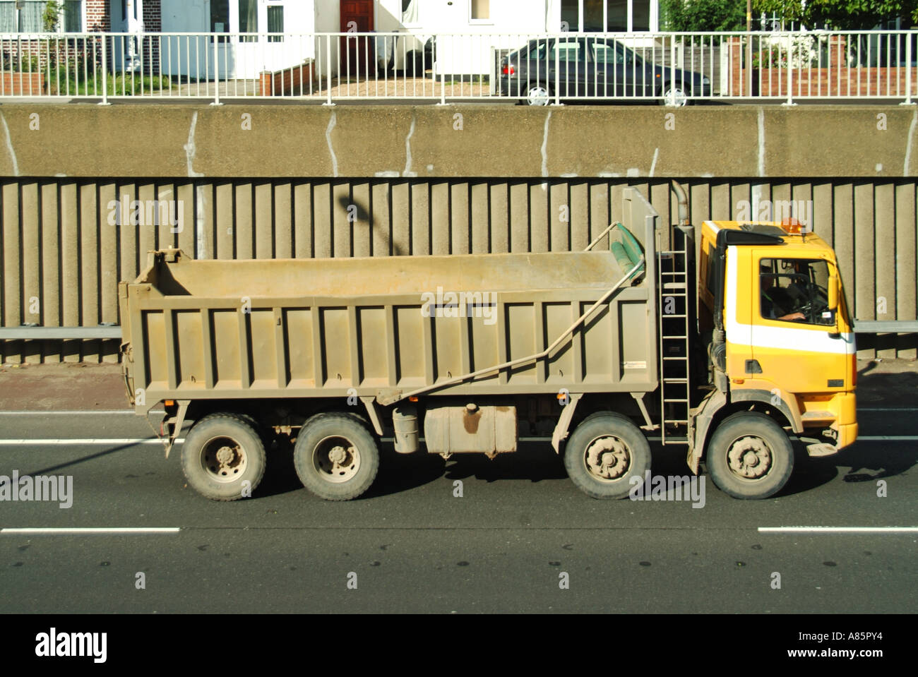 Sand and ballast tipper delivery lorry travelling empty Stock Photo - Alamy