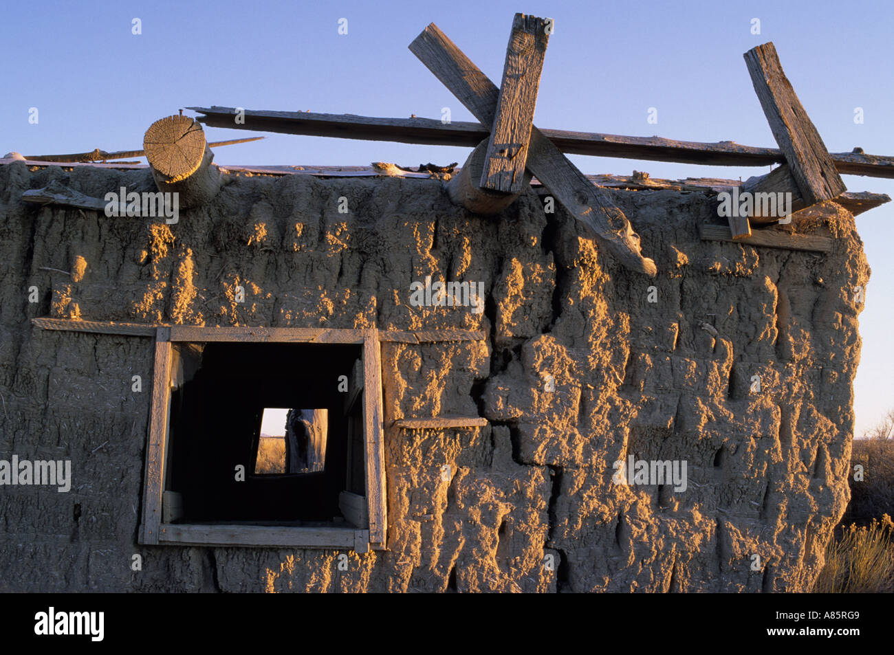 A view through the windows of a mud-brick house in Colorado, USA Stock ...