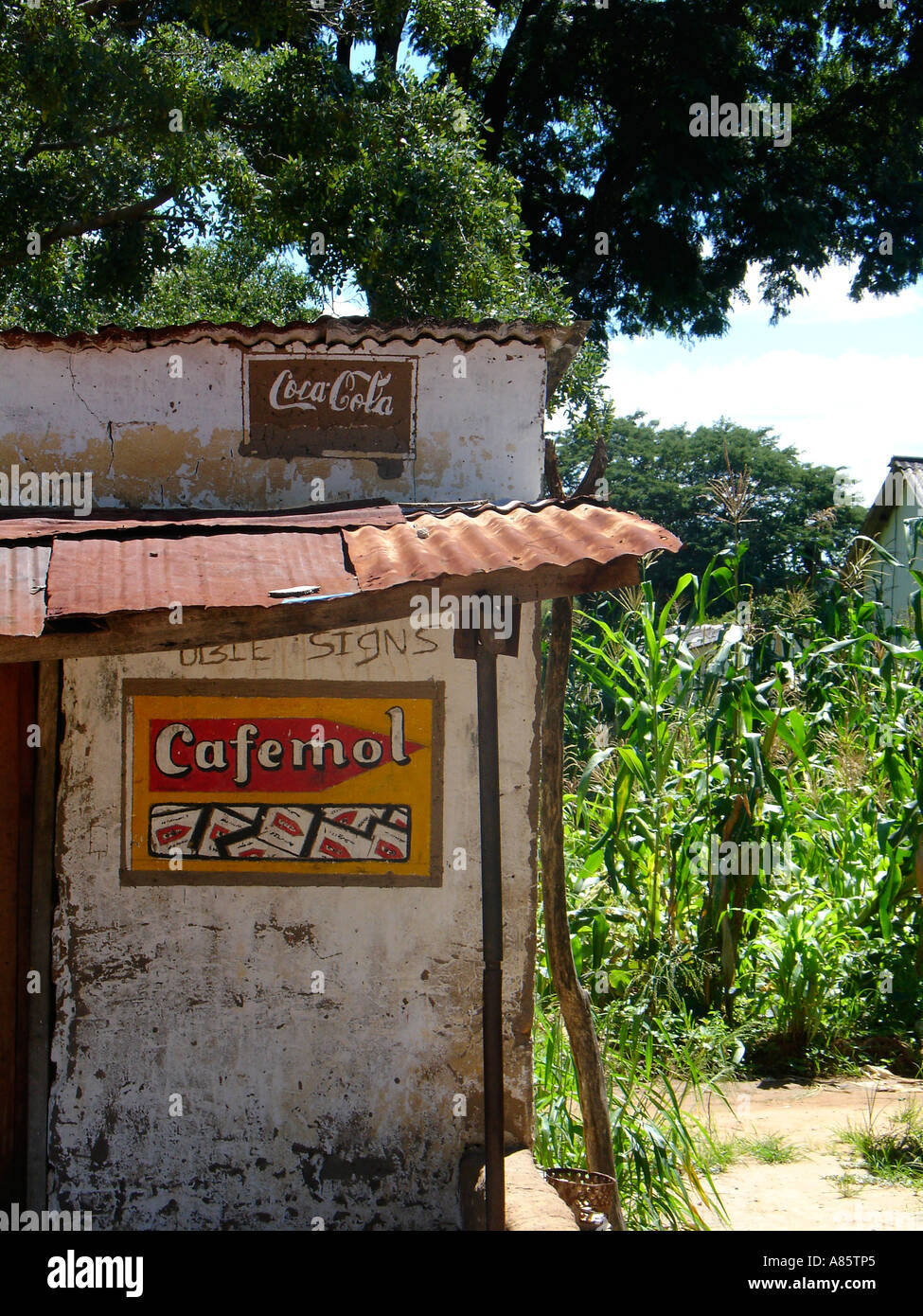Typical painted advertisements of Coca-Cola and Cafemol on side of ...