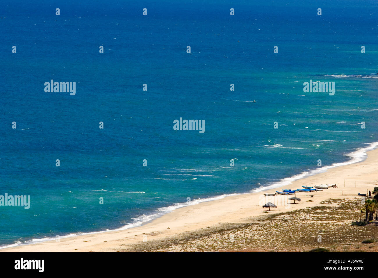 Boats on beach East Cape Baja Mexico Stock Photo - Alamy