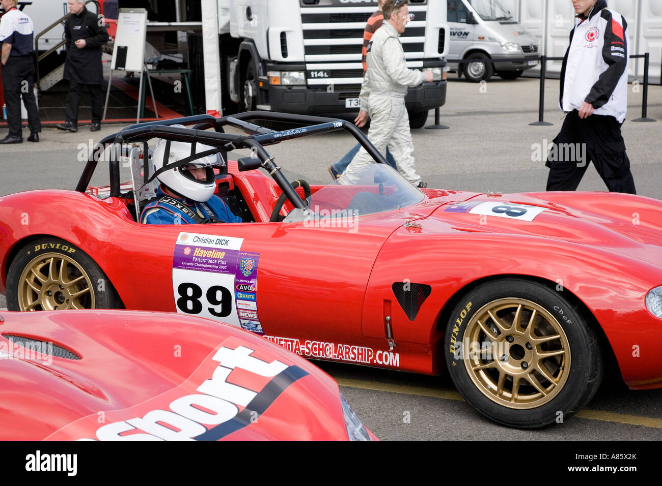 Ginetta racing cars lined up in the paddock ready for racing at Oulton ...
