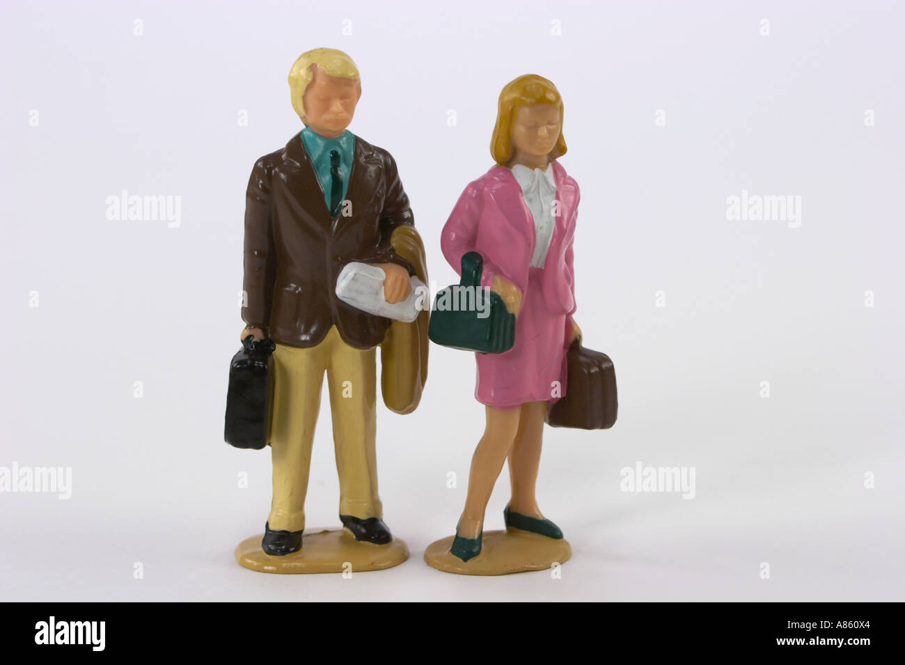 Two figurines of business people Stock Photo - Alamy