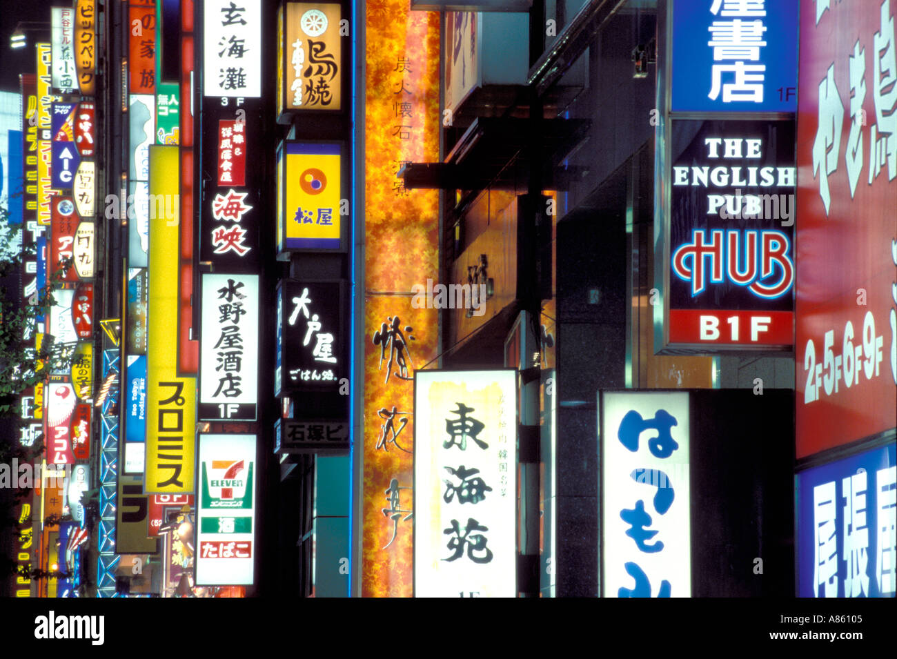 A multitude of neon signs light up the night in Kabukicho, one of the ...