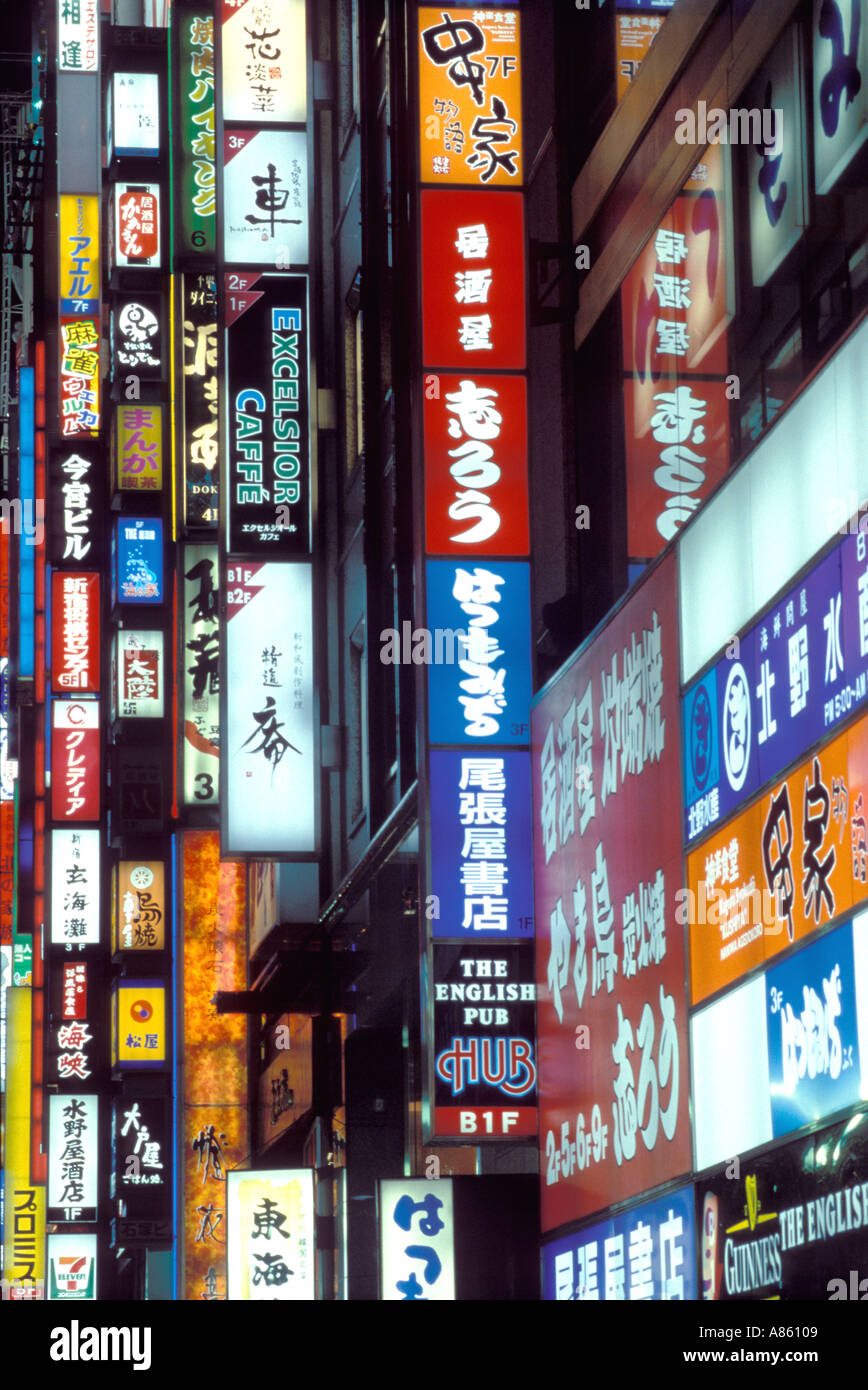 A multitude of neon signs light up the night in Kabukicho, one of the ...