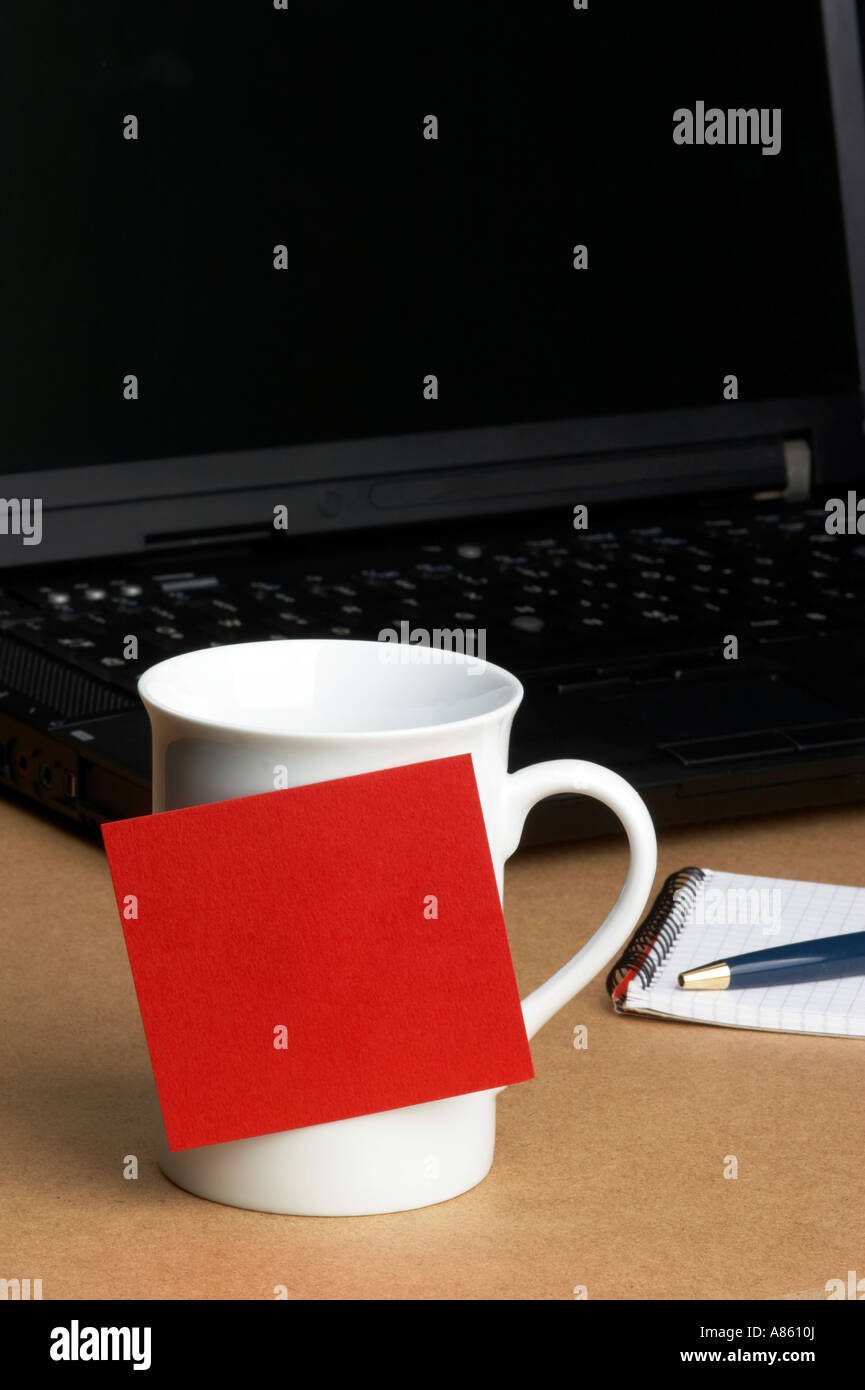 Cup of coffee with post-it on a desk Stock Photo - Alamy