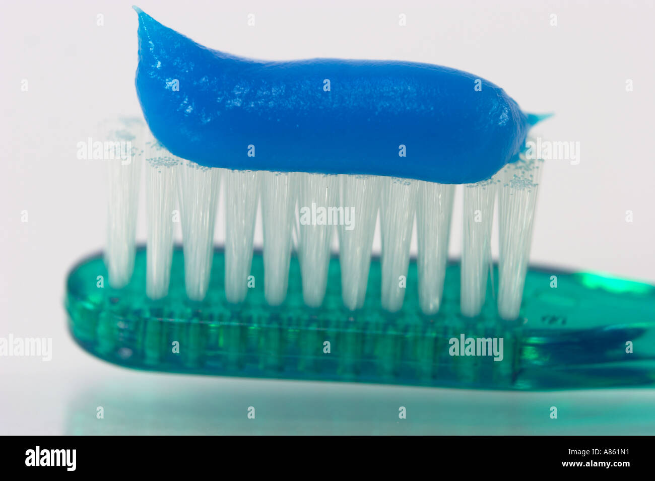 A close up of a tooth brush (detail) with tooth paste Stock Photo - Alamy