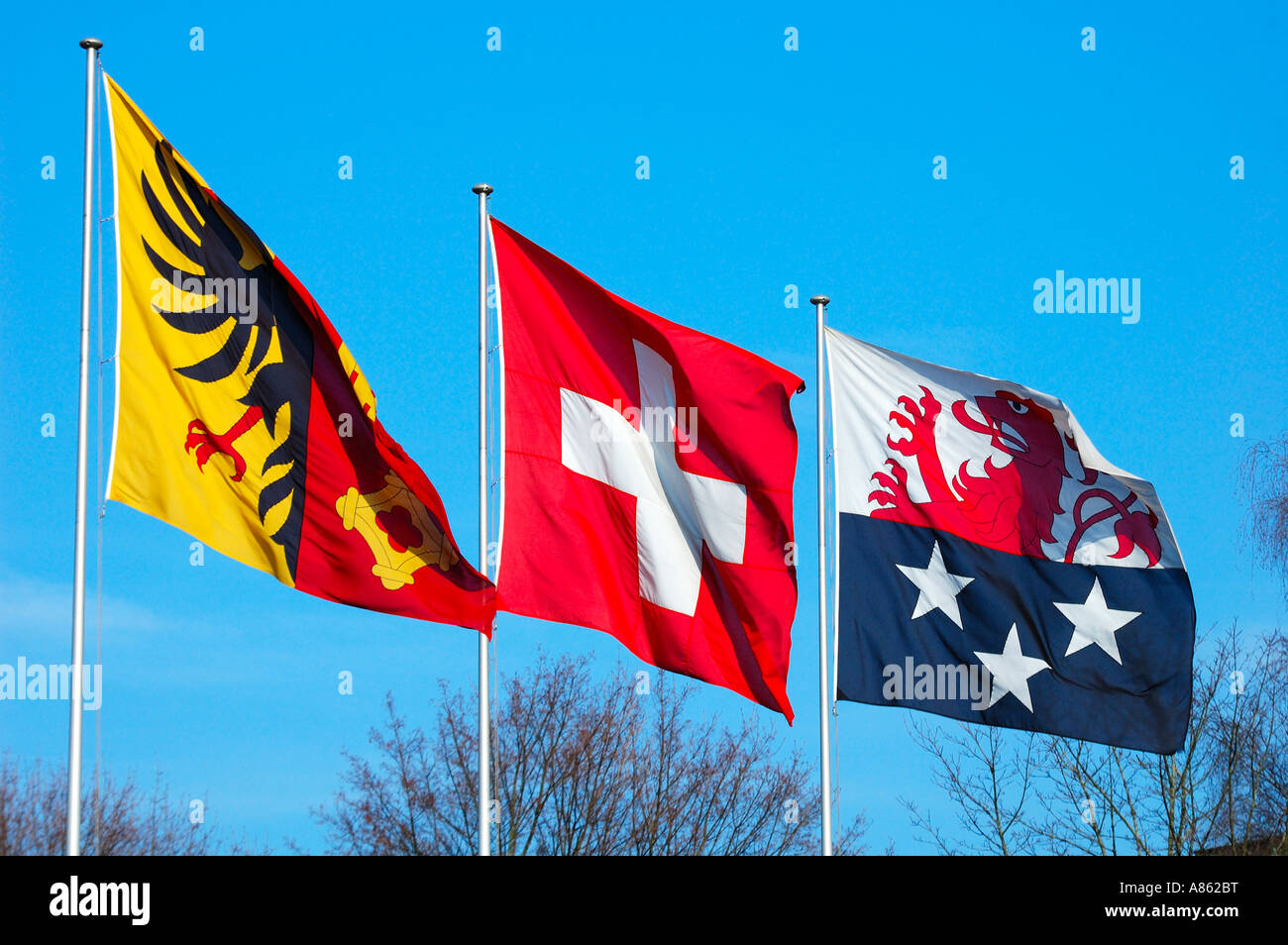 Three Swiss flags (from L to R) the canton of Geneva, of Switzerland ...