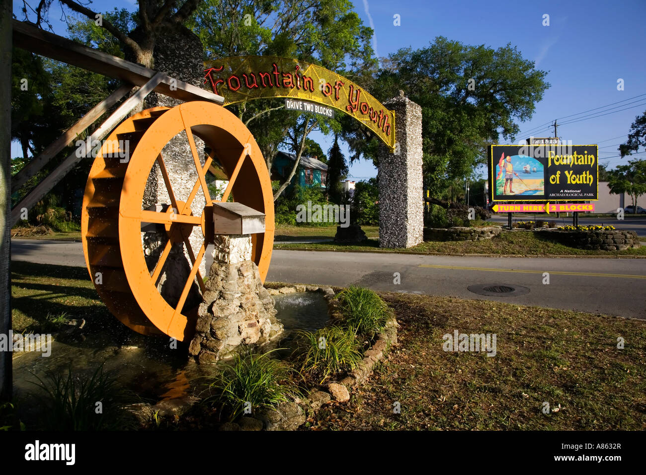 The entrance water wheel and advertising sign for the fountain of youth ...