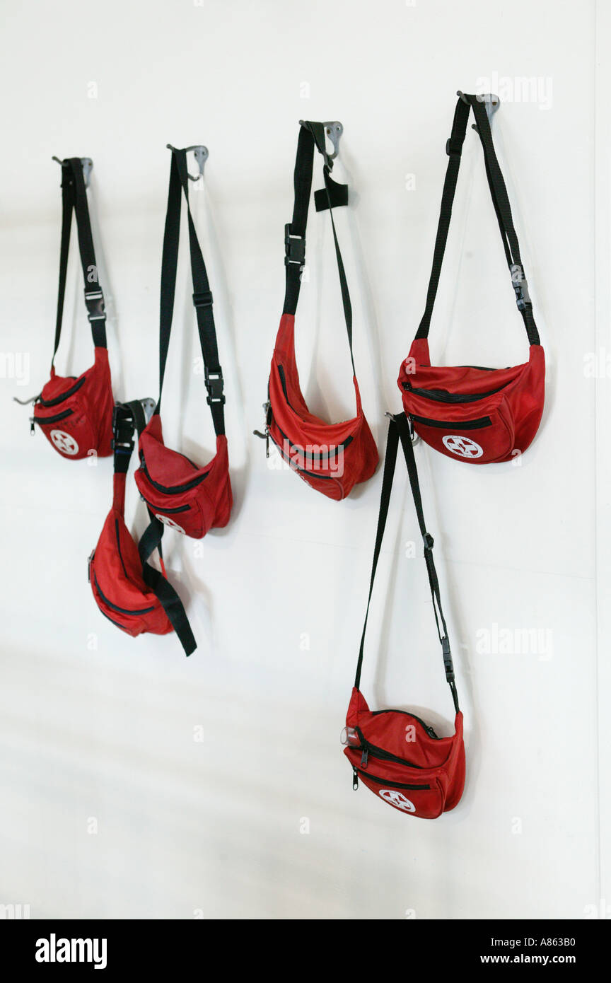 First aid kits hanging from wall Stock Photo - Alamy