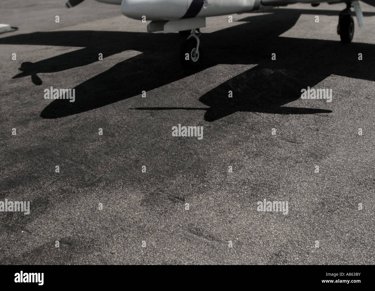 Plane Shadow on Tarmac Stock Photo - Alamy