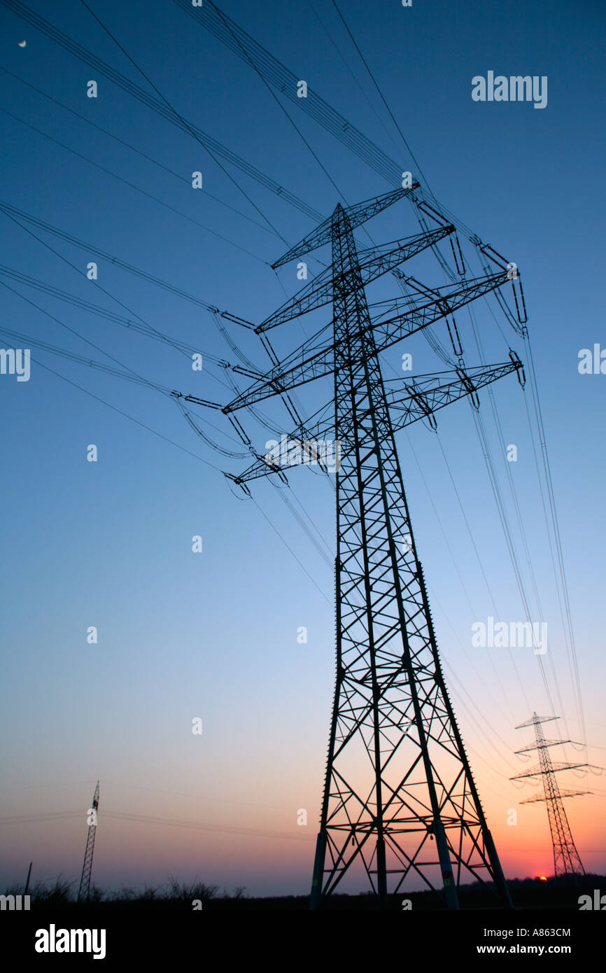 a pylon in front of the setting sun Stock Photo - Alamy